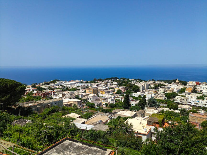 Capri white buildings against blue sea