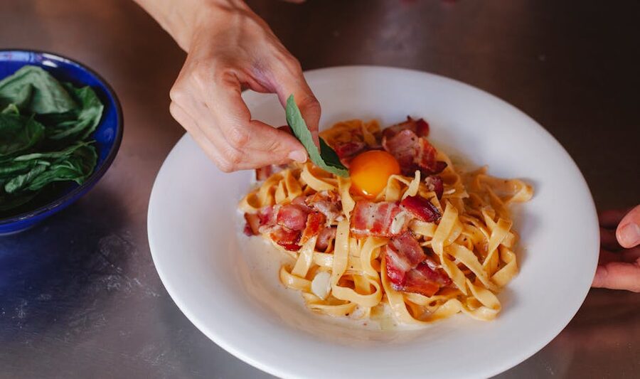 Carbonara pasta with bacon and egg yolk
