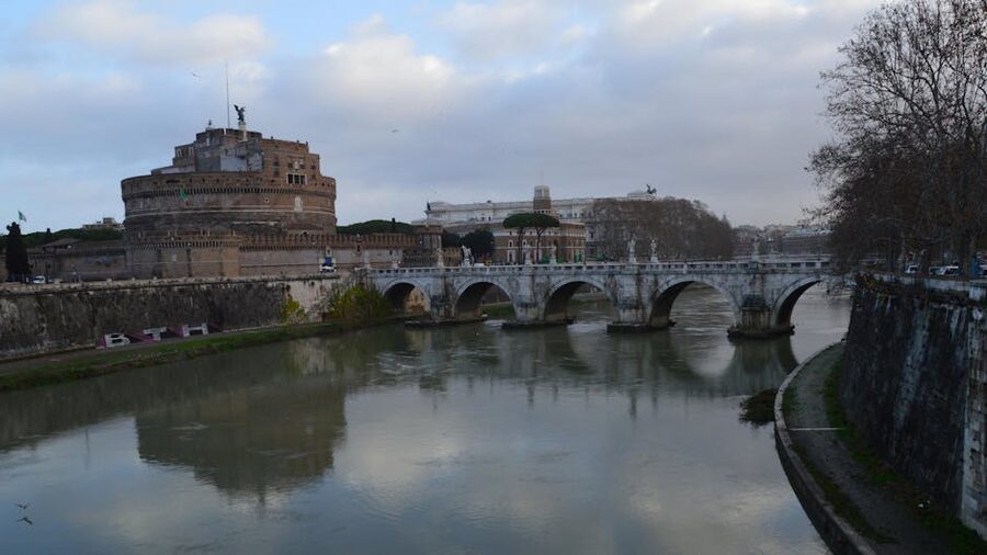 Castel Sant'Angelo with bridge reflection on the Tiber, Rome