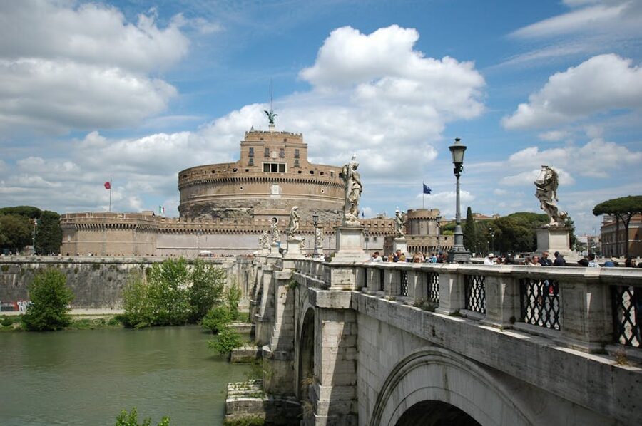 Castel Sant'Angelo and Bridge of Angels with dramatic sky, Rome