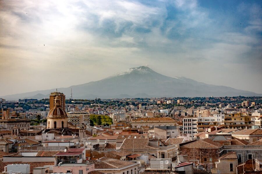 Catania Sicily cityscape with Mount Etna
