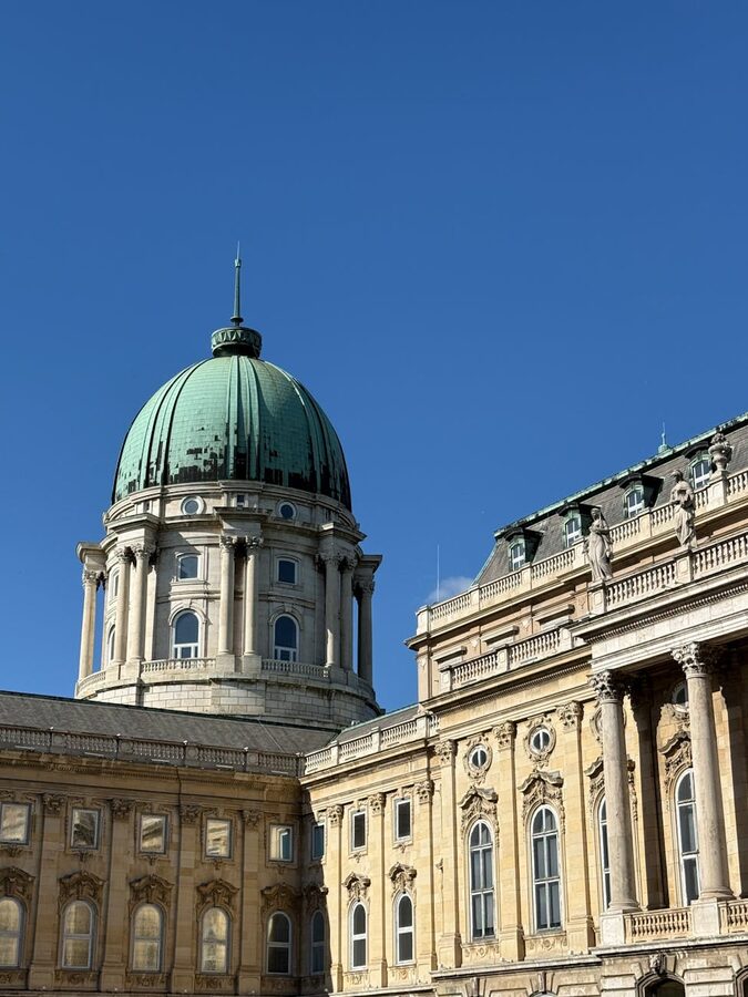 Buda Castle dome under clear blue sky