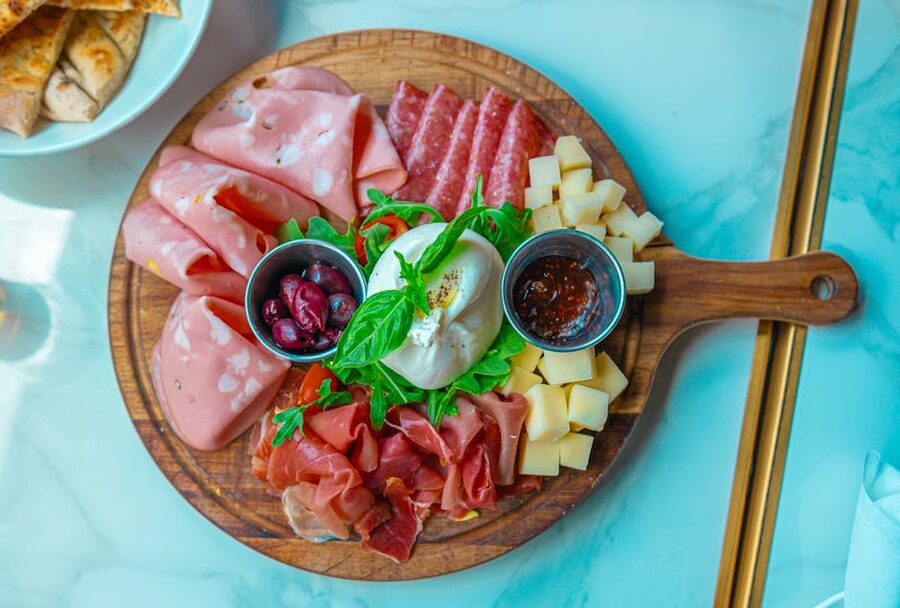 Charcuterie board with assorted meats