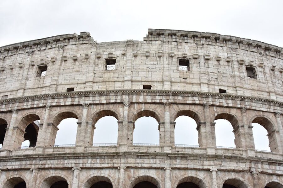 Ancient arches and architectural detail of the Colosseum in Rome