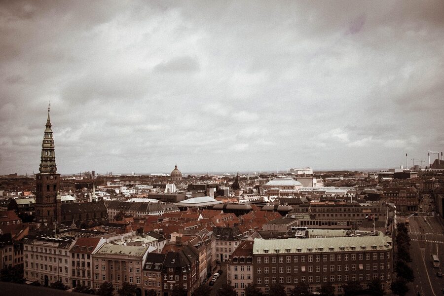 Copenhagen skyline at night with spires and lights