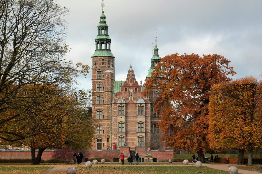 Rosenborg Castle surrounded by autumn foliage in Copenhagen