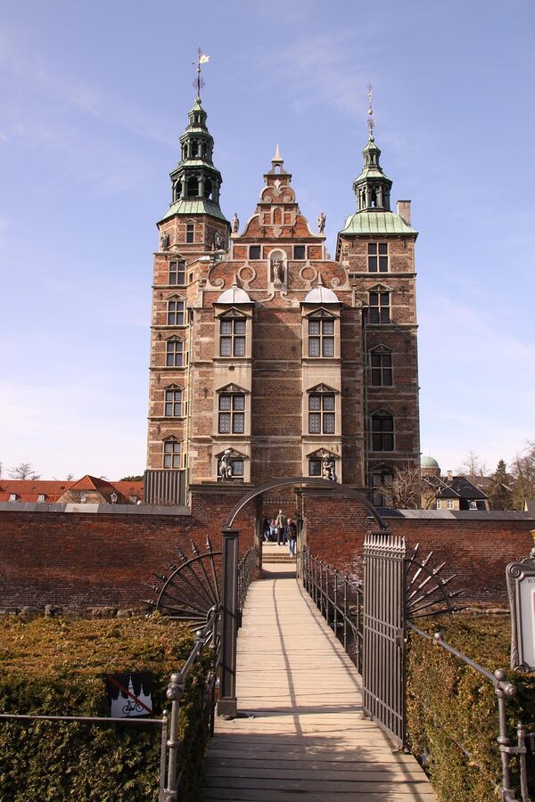 Rosenborg Castle entrance with bridge and gardens in Copenhagen