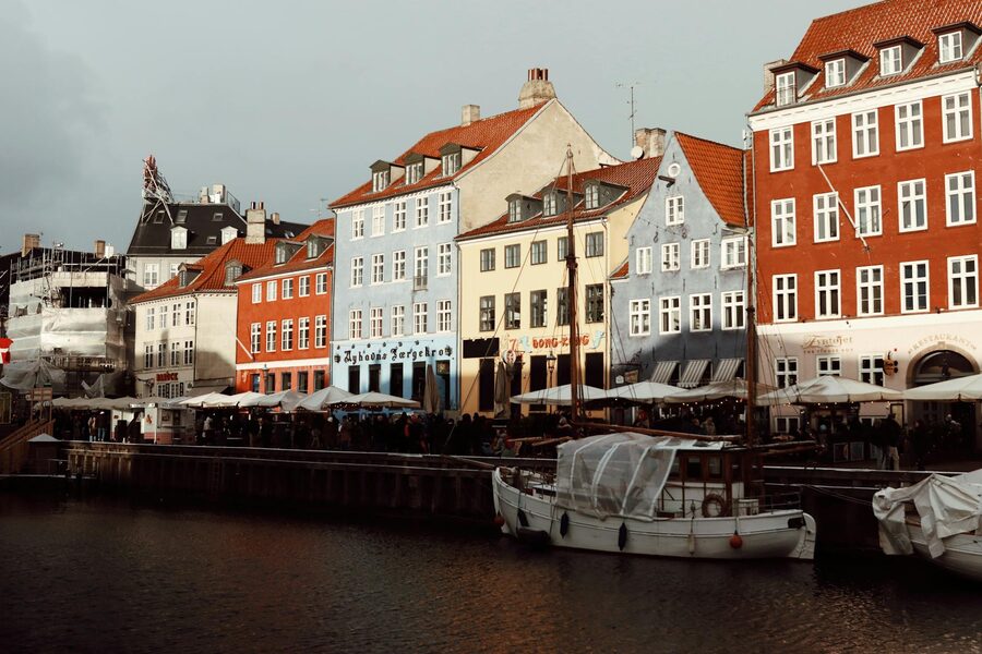 Nyhavn waterfront in winter with colorful buildings and bare trees