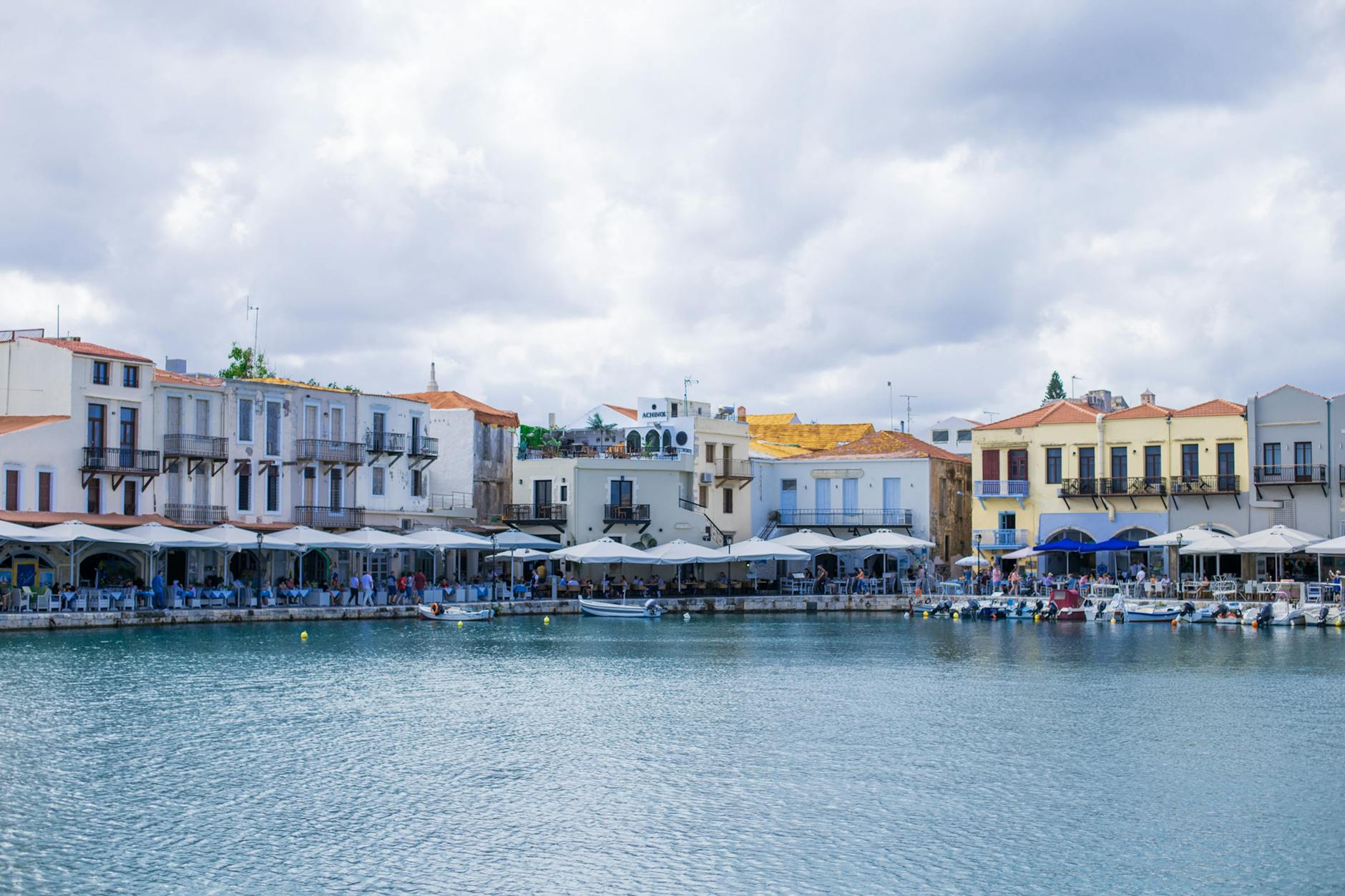 Charming waterfront in Crete with colorful buildings