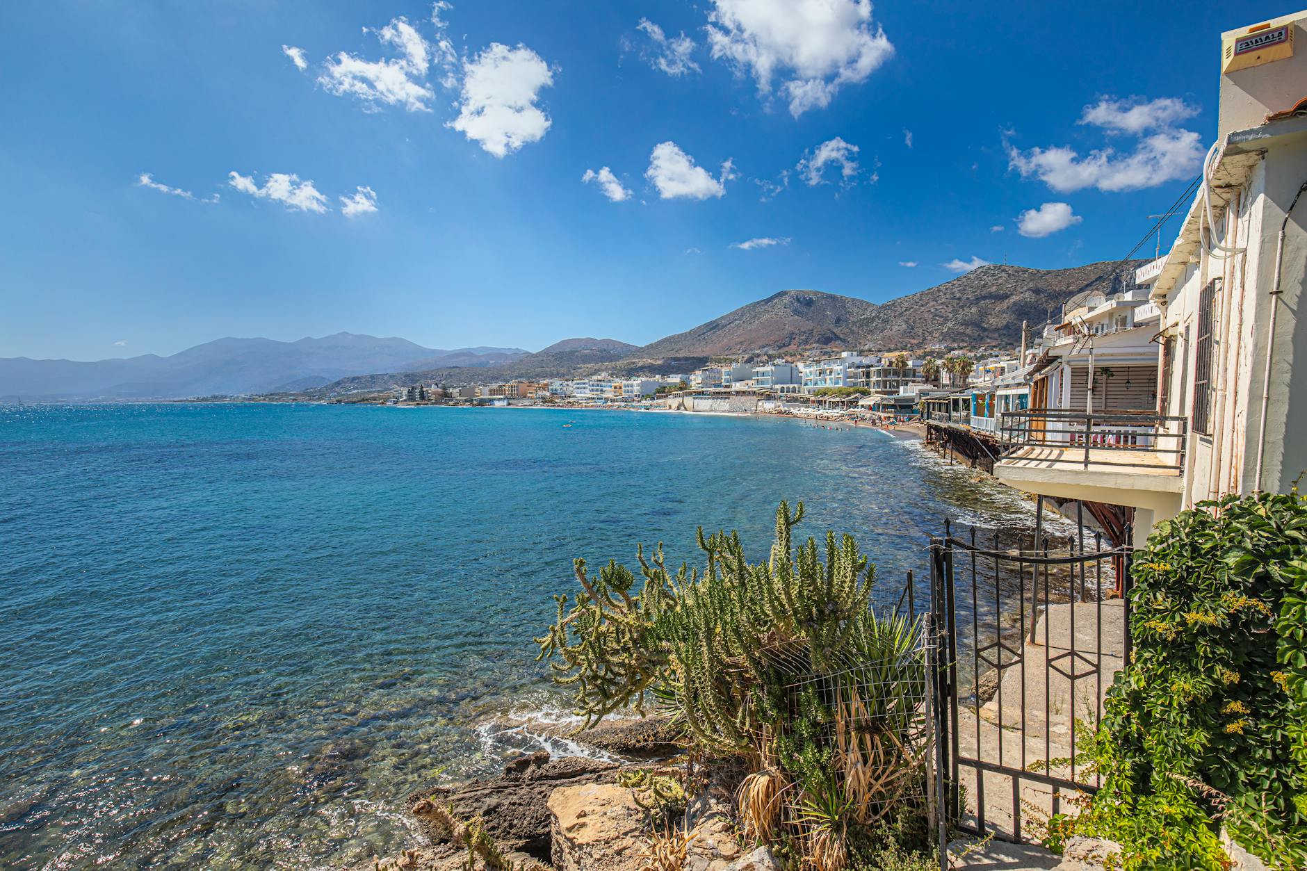 Mediterranean coastal town in Crete under clear skies