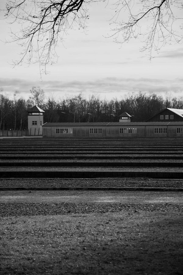 Black and white historical photograph from Dachau memorial exhibition