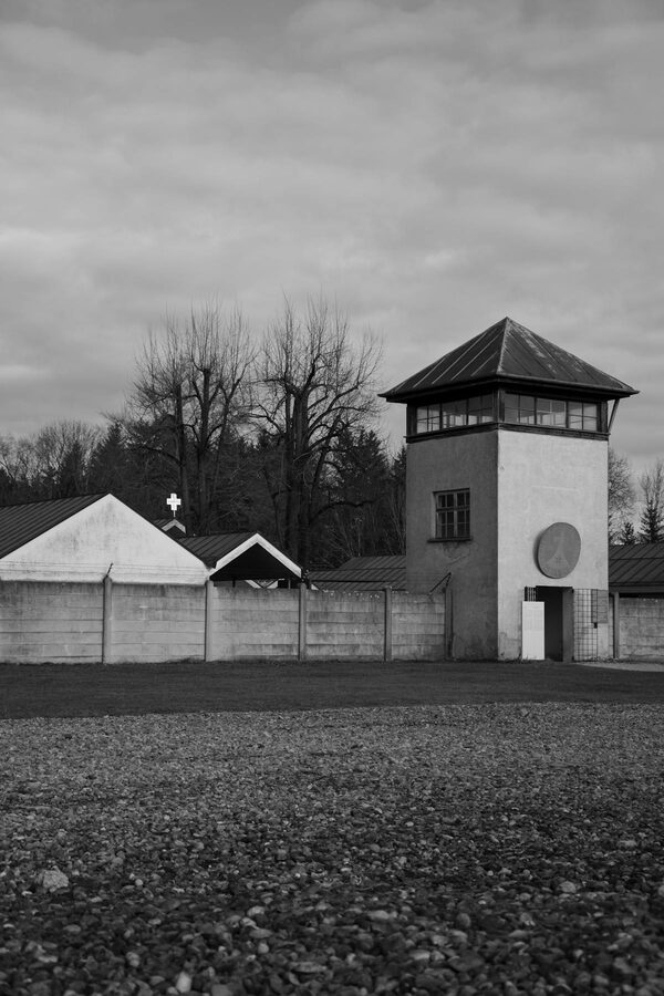 Black and white image of a guard tower at Dachau memorial