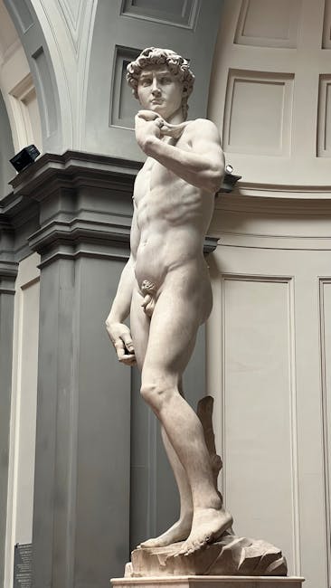 David statue indoor museum Florence with visitors