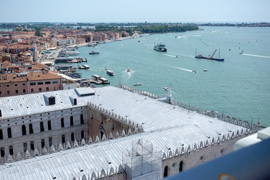 Doges Palace Venice aerial view with harbor and lagoon