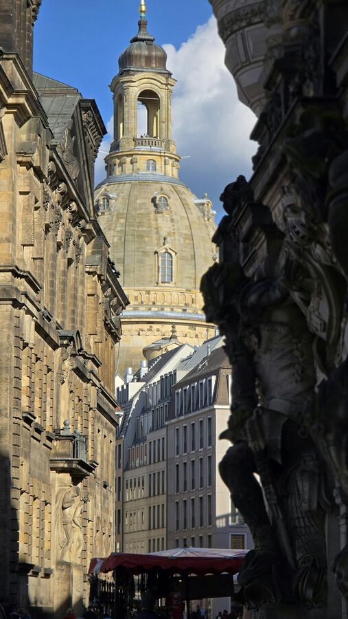 Frauenkirche in Dresden framed by historic buildings