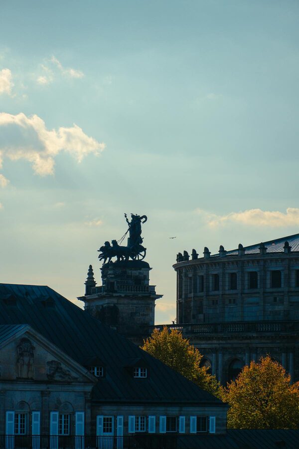 Dresden architectural silhouette with horseman statue at dusk