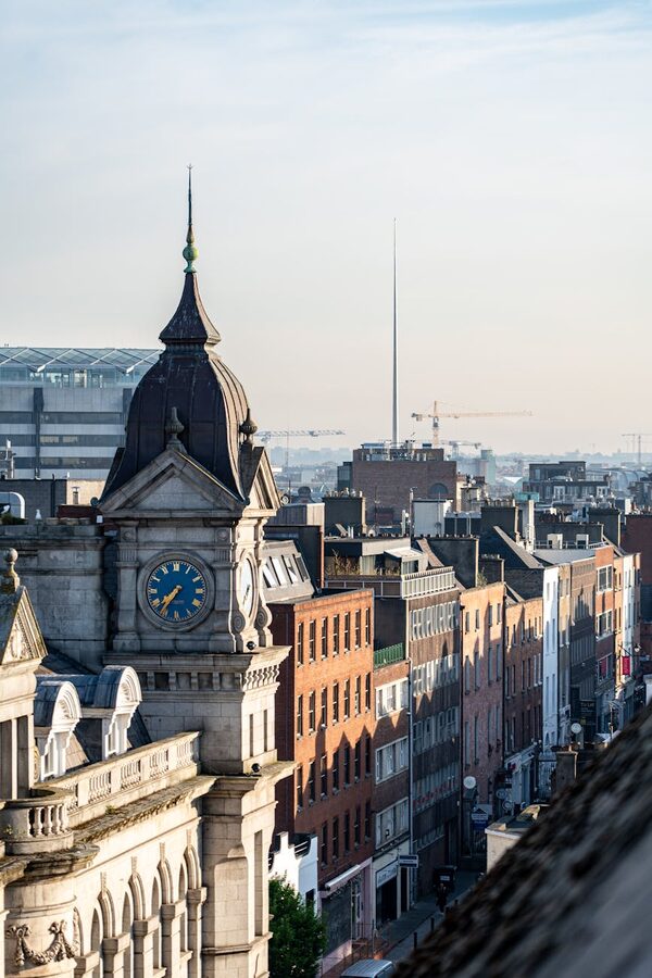 Aerial view of Dublin at sunrise with the Spire and clock tower visible
