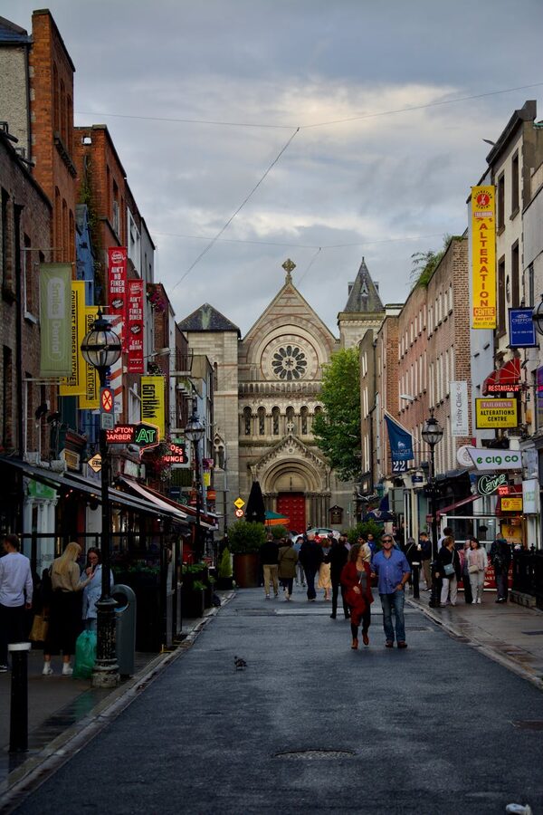 Grafton Street in Dublin with St Anns Church and pedestrians