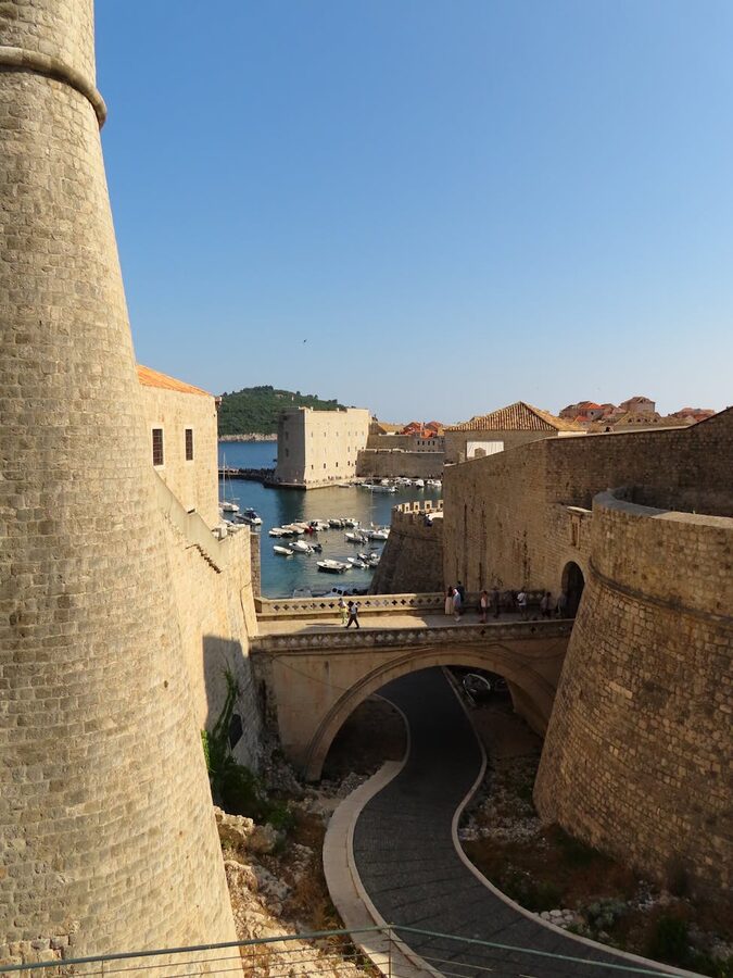 Ancient walls of Dubrovnik overlooking marina