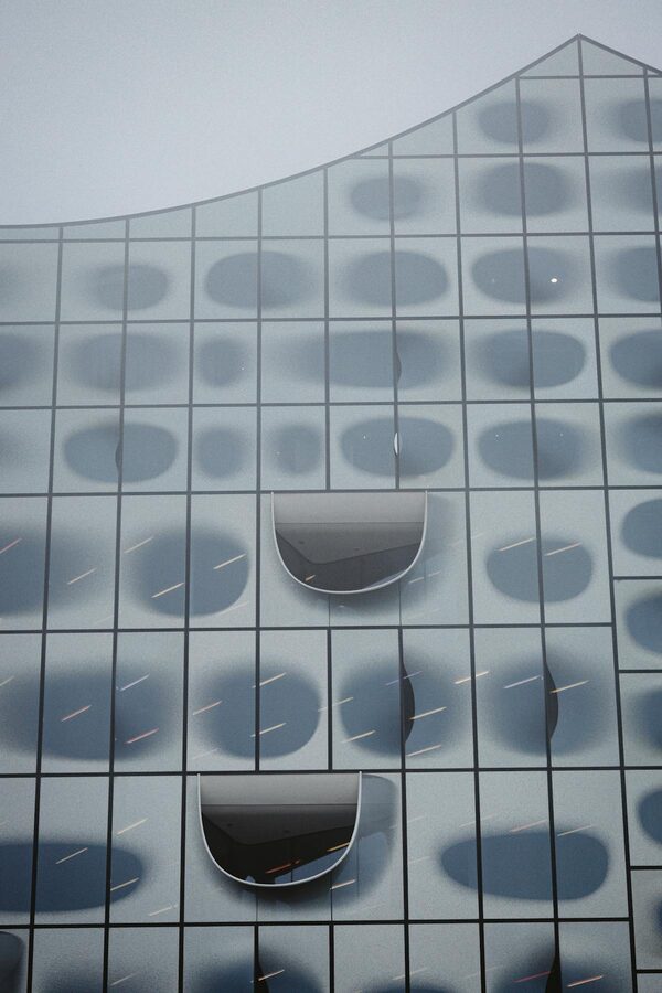 Detailed view of curved glass panels on the Elbphilharmonie facade