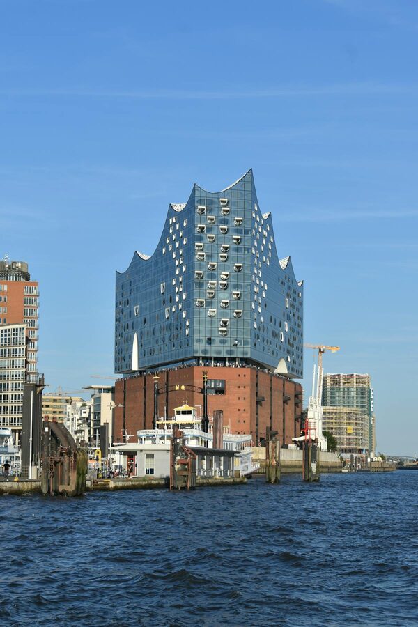 Elbphilharmonie seen from the water with boats in the foreground