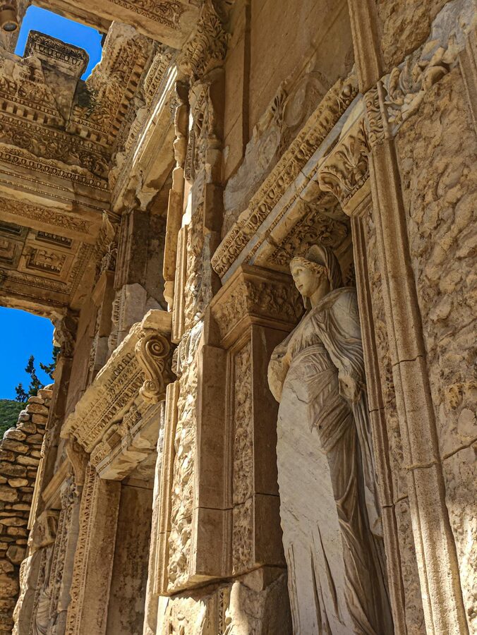 Carved stone statue in the facade of the Library of Celsus at Ephesus