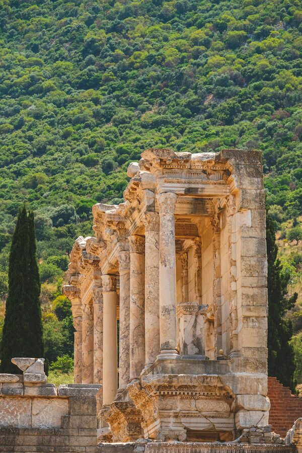 Ancient marble-paved street at Ephesus lined with columns and ruins
