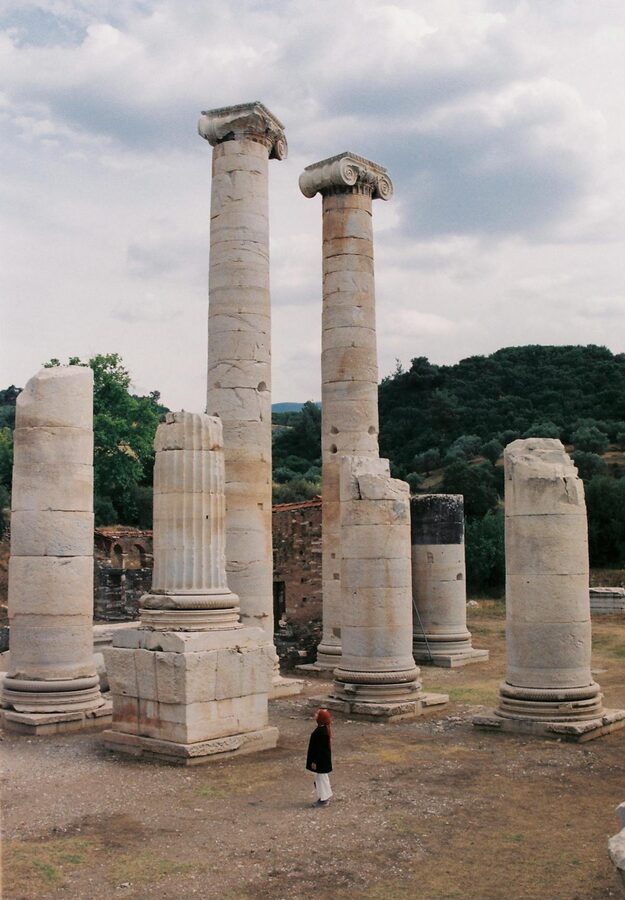 Single standing column of the Temple of Artemis with ruins at its base