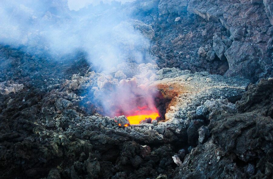 Etna crater with ash and steam