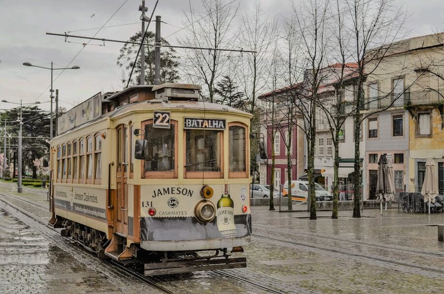 Porto vintage tram on wet street