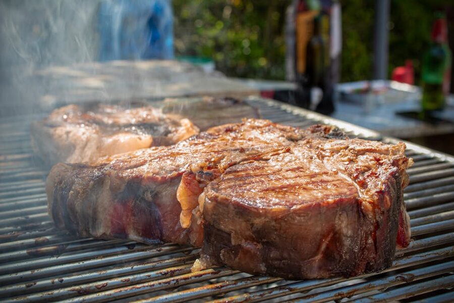 Fiorentina steak grilling outdoors