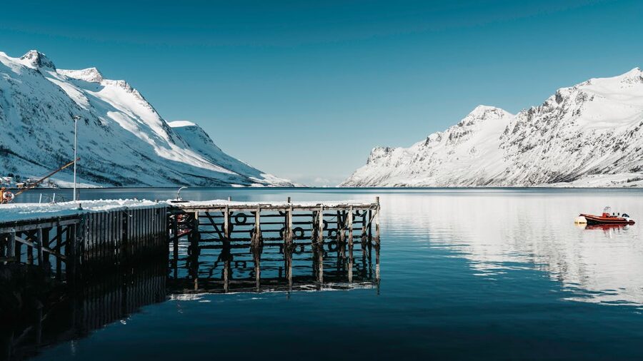 Fjord with mountain reflections