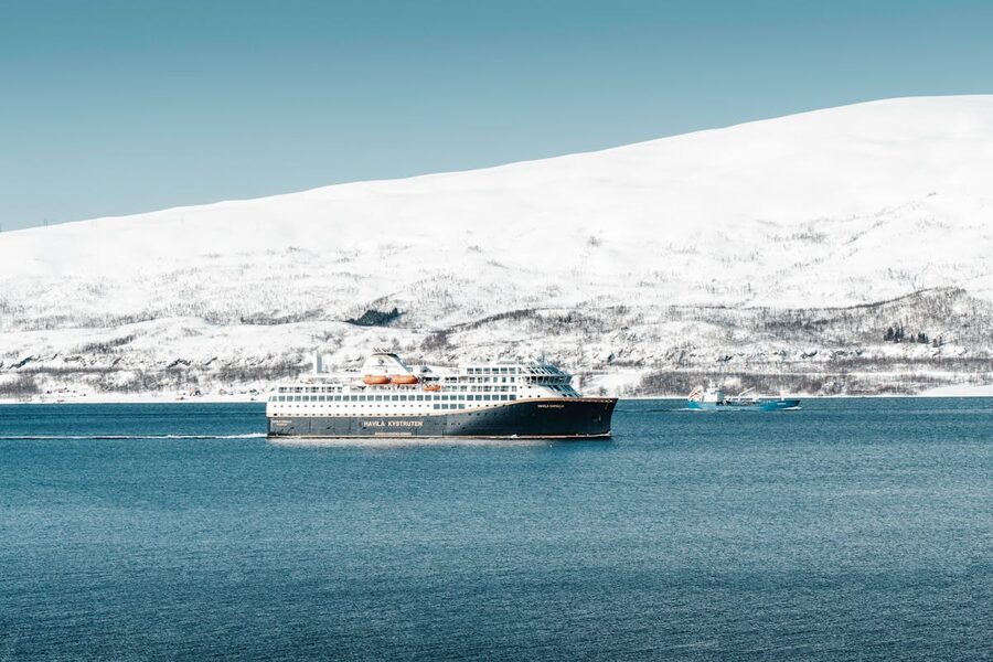 Fjord with calm waters and snow-capped peaks