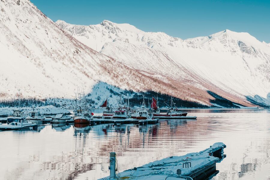 Fjord with reflections and mountains