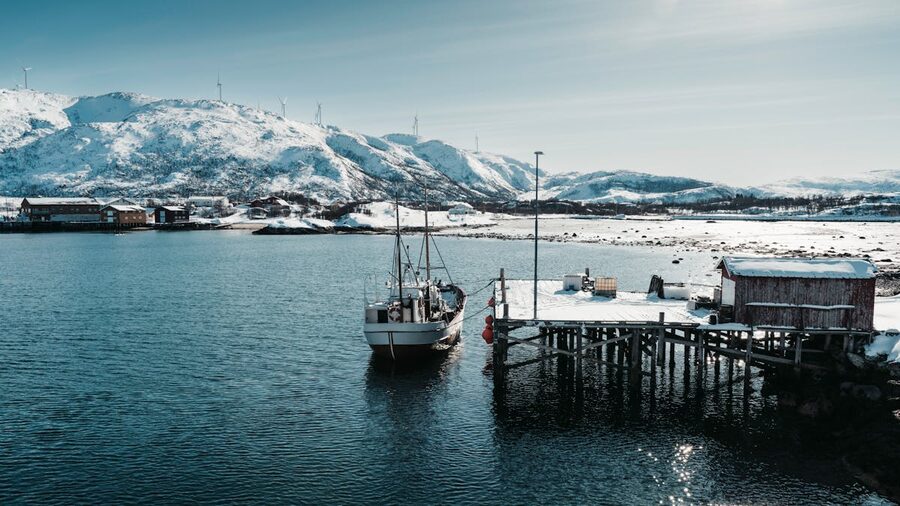 Winter fjord with dramatic sky