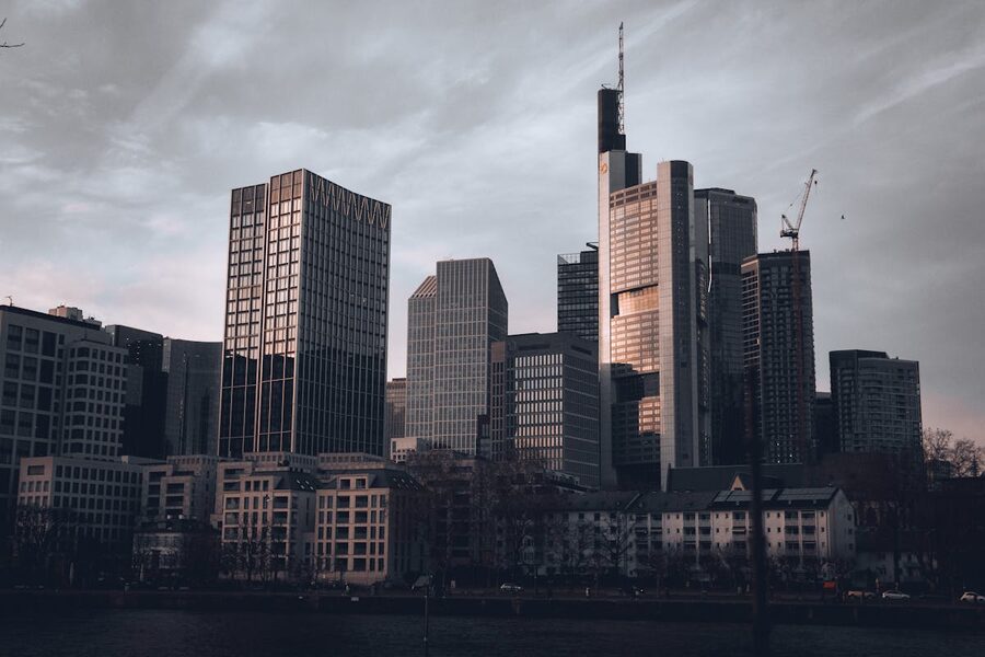 Frankfurt skyline at dusk with modern skyscrapers and city lights