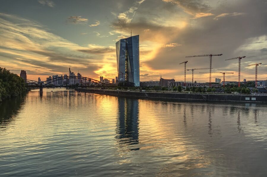 European Central Bank building in Frankfurt at sunset reflected in river