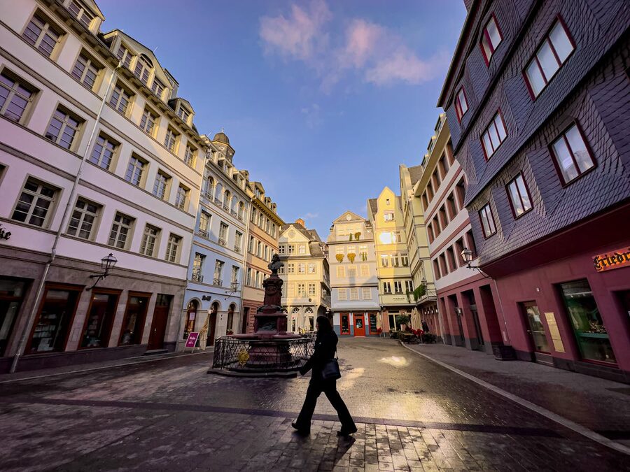Colorful facades and pedestrians in Frankfurt old town district