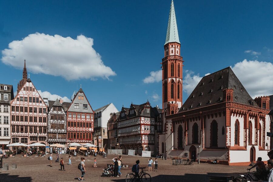 Römerplatz in Frankfurt with historic half-timbered buildings and St Nicholas Church