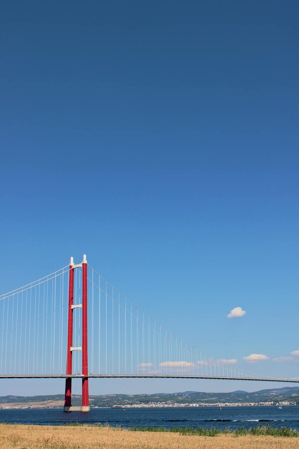 The 1915 Canakkale Bridge spanning the Dardanelles strait under clear blue sky