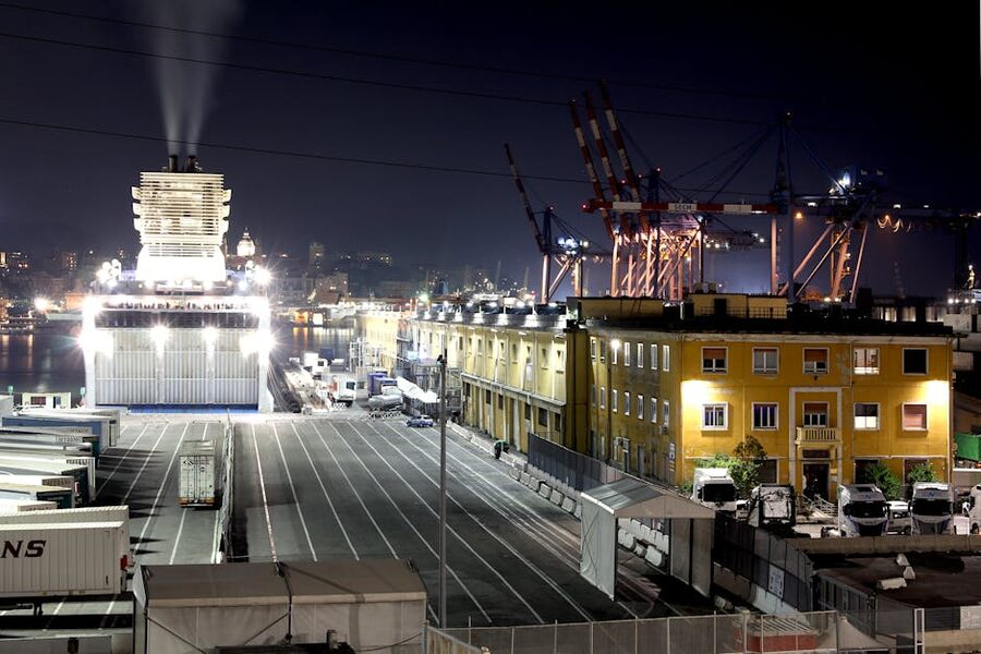 Genoa harbor at night with ships