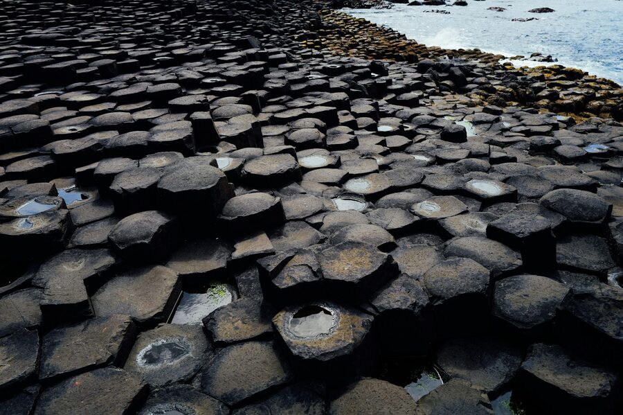 Interlocking basalt pillars at Giants Causeway on the Northern Ireland coast