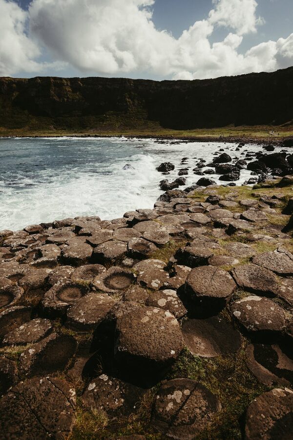 Basalt columns at Giants Causeway reaching into the Atlantic Ocean