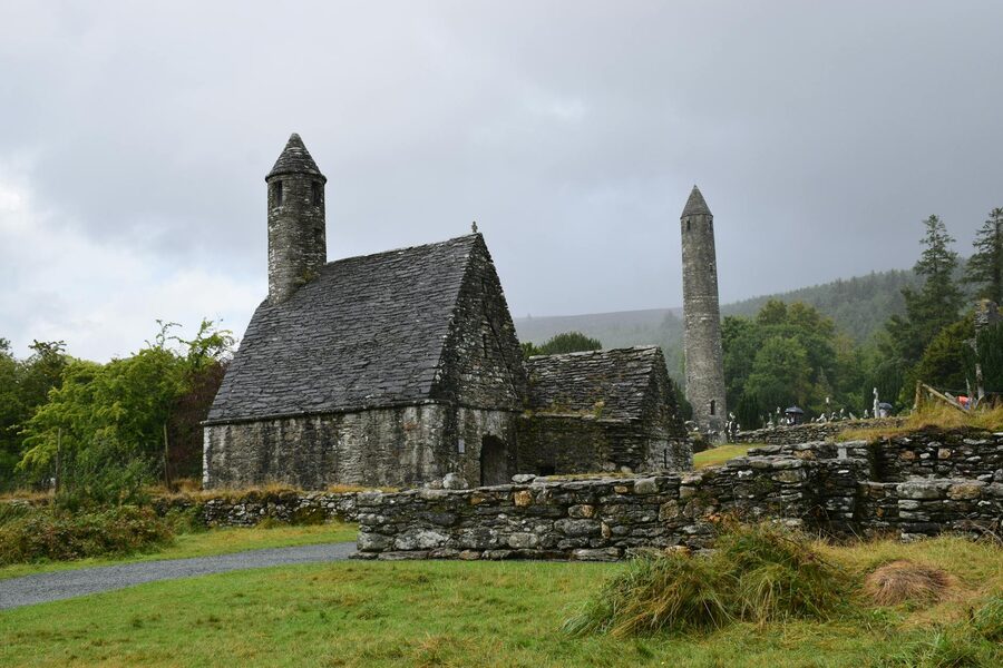 St Kevins Church stone building at Glendalough under overcast sky