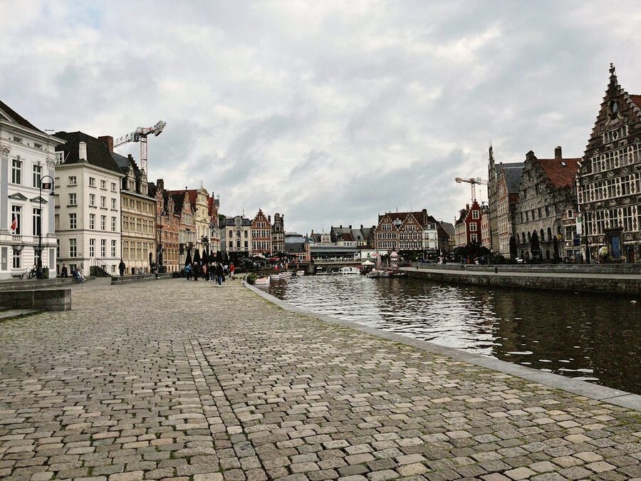 Ghent canal scene with boats and architecture