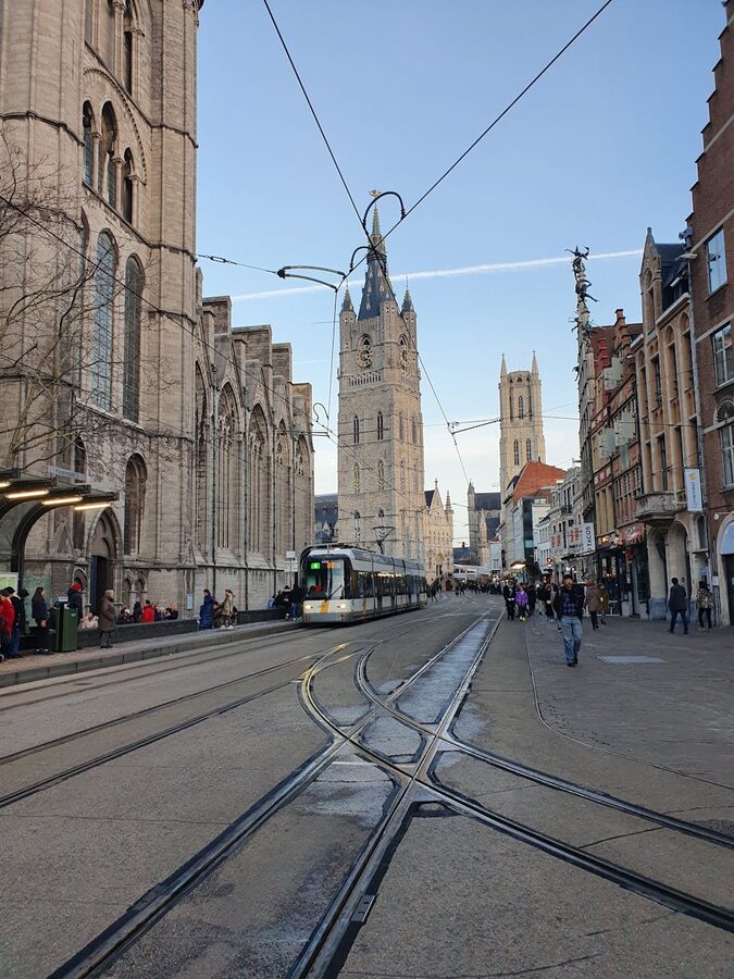 Tram passing Belfry of Ghent