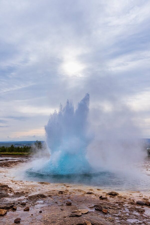 Strokkur geyser erupting in the Geysir geothermal area on the Golden Circle