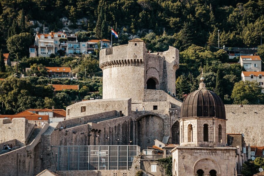 Dubrovnik fortress wall with greenery and architecture