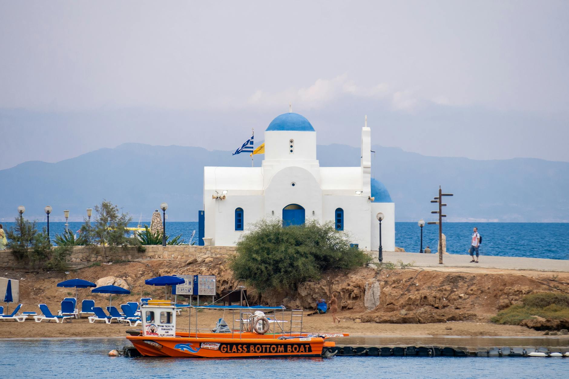 White Greek chapel by the blue sea