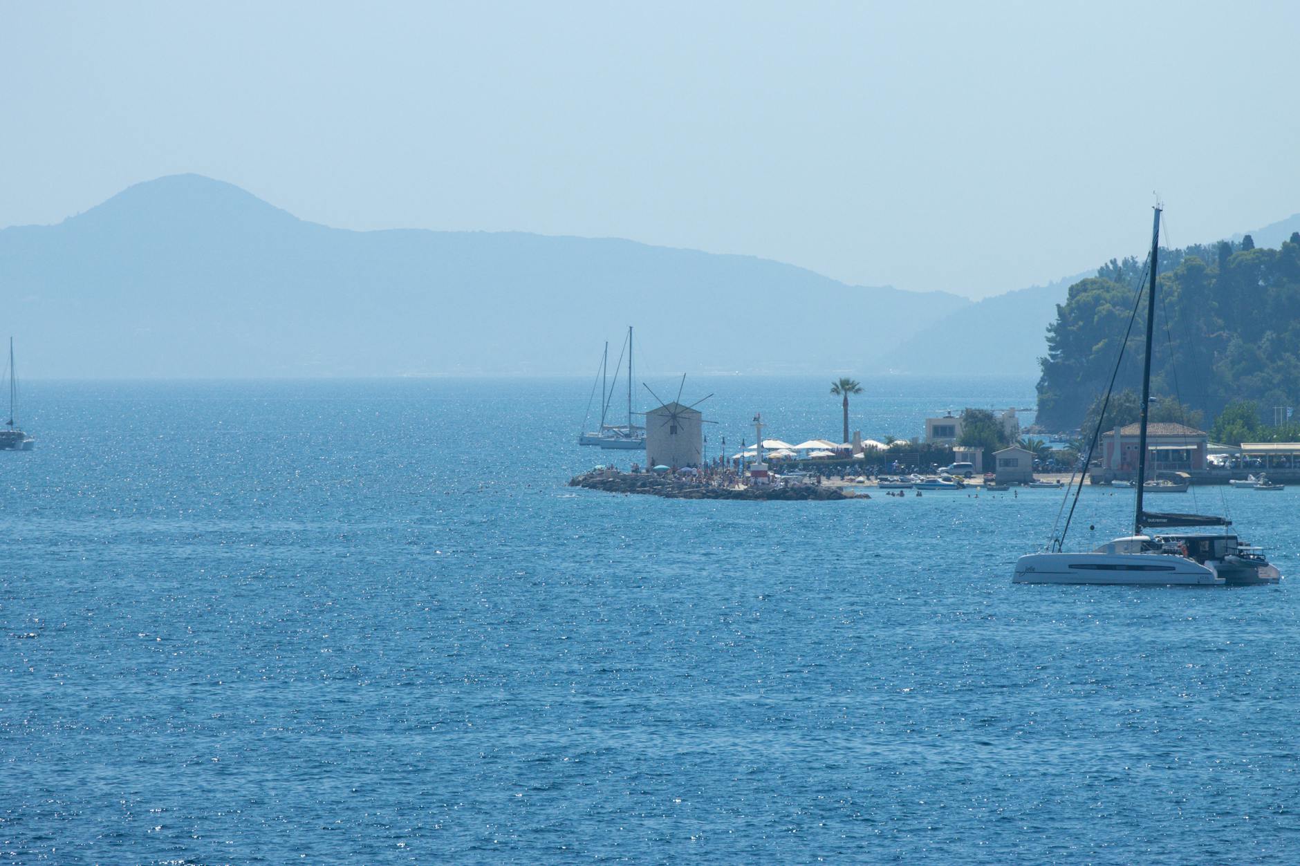 View of yachts by a Greek island